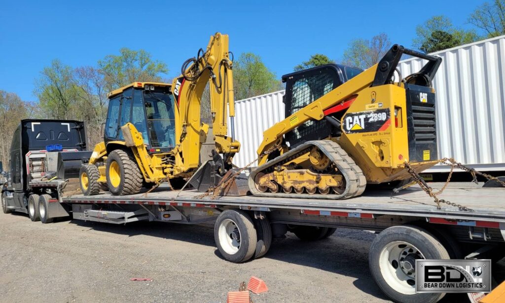 How to Haul Backhoes Without Damage - Bear Down Logistics